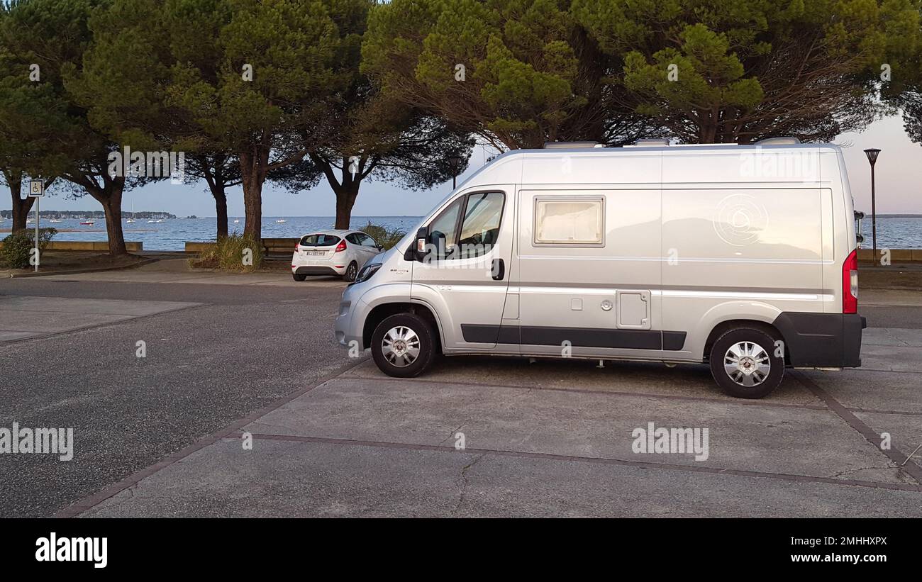 camper van with a view of a lake in carcans Maubuisson French south ...