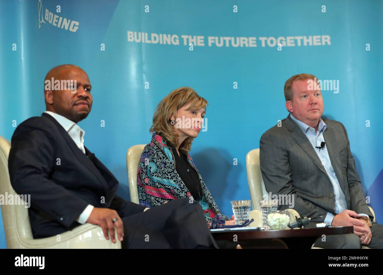 From left, Ted Colbert, resident and CEO of Boeing Global Services; Leanne Caret, president and ...