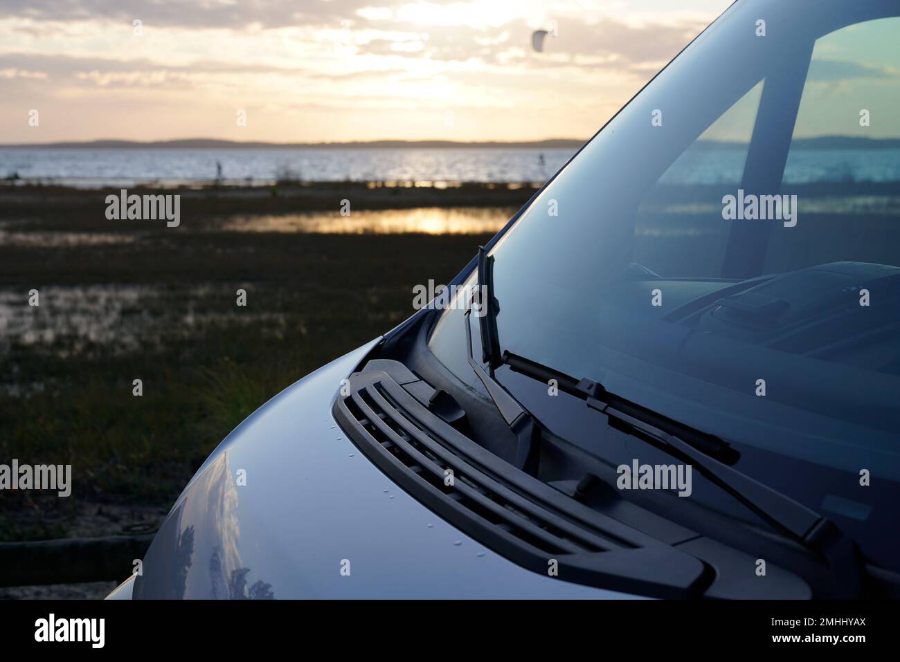 campervan vehicle recreational rv on beach during sunset in vanlife ...