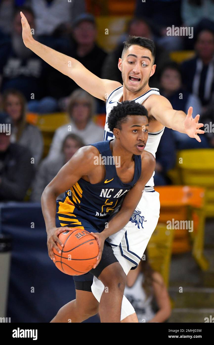 North Carolina A&T guard Fred Cleveland Jr. (2) looks to pass the ball ...