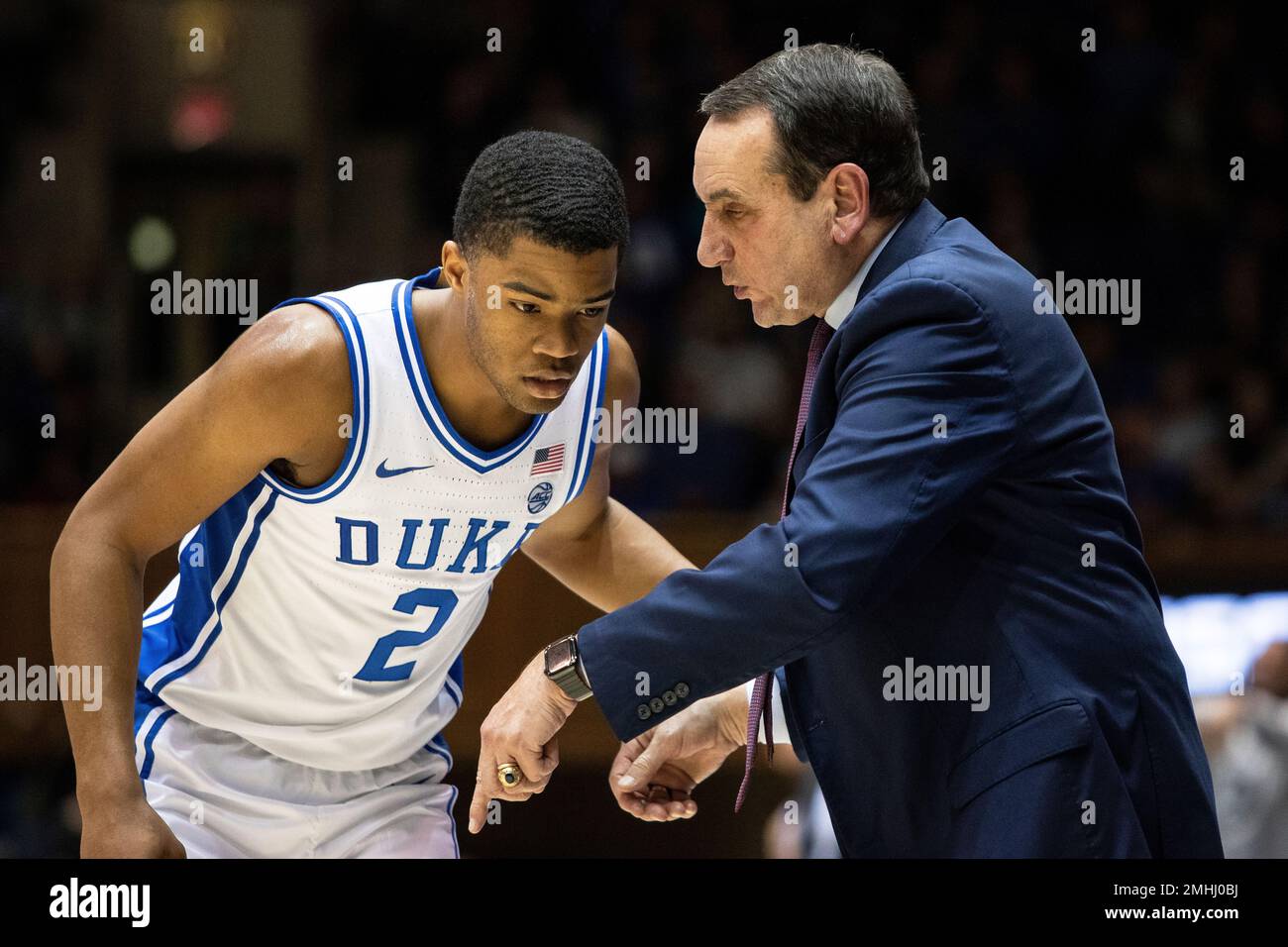 Duke Head Coach Mike Krzyzewski, right, speaks to Duke's Cassius ...