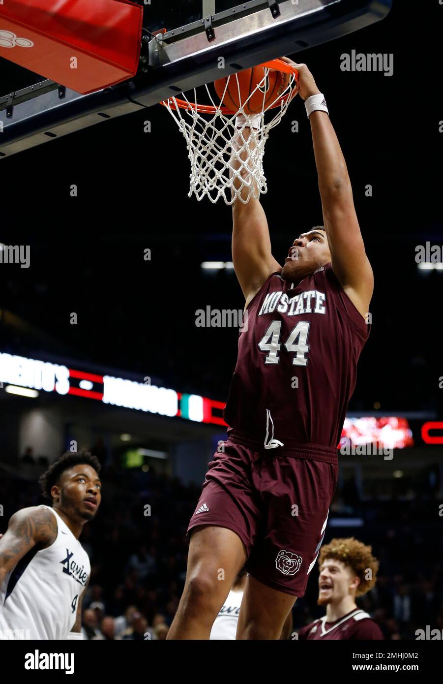 Missouri State forward Gaige Prim (44) dunks over Xavier forward ...
