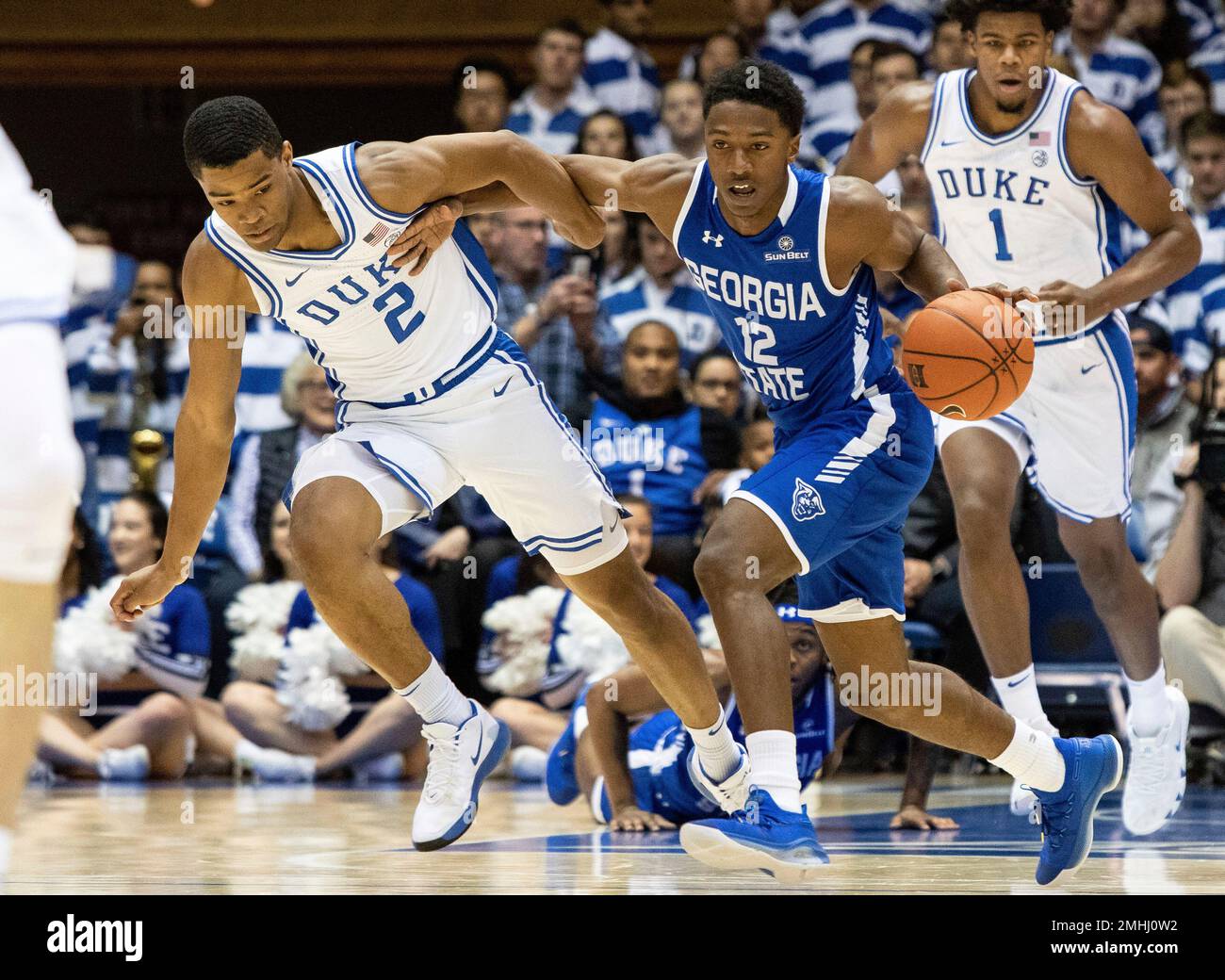 Georgia State's Kane Williams (12) shoves Duke's Cassius Stanley (2) as ...