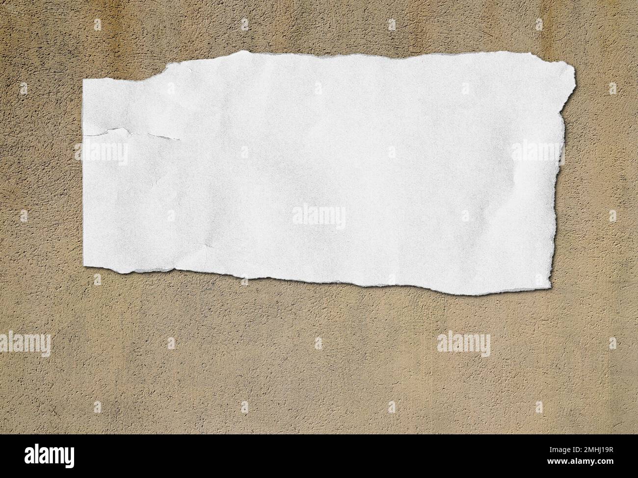 Old piece of paper sheet torn up mockup on brown sand floor wall ...