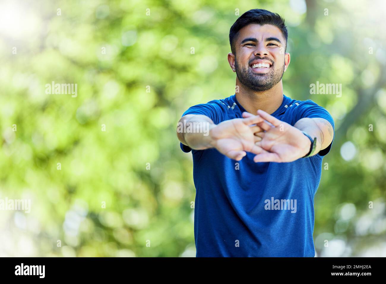 Fitness, mock up and stretching arms with a man outdoor in nature for a ...