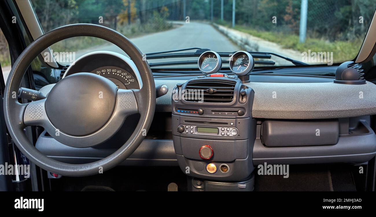 Car steering wheel and interior background, modern city car elements ...