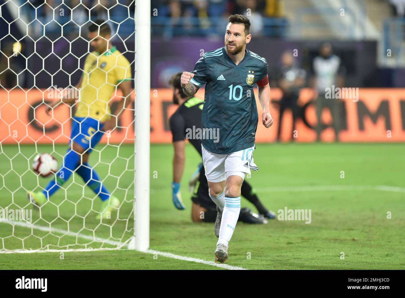 Argentina's Lionel Messi celebrates after scoring his side's opening ...