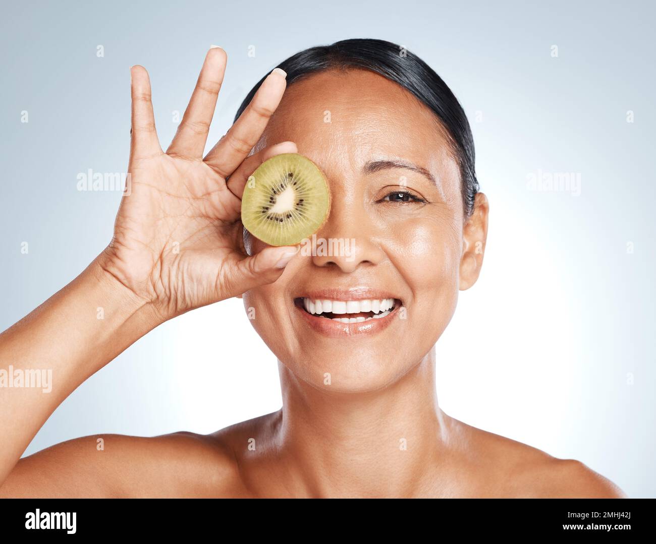 Beauty, kiwi product and portrait of woman with smile on face for ...