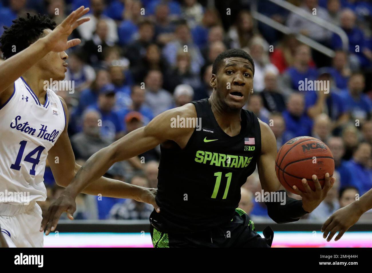Michigan State forward Aaron Henry (11) in action against Seton Hall ...