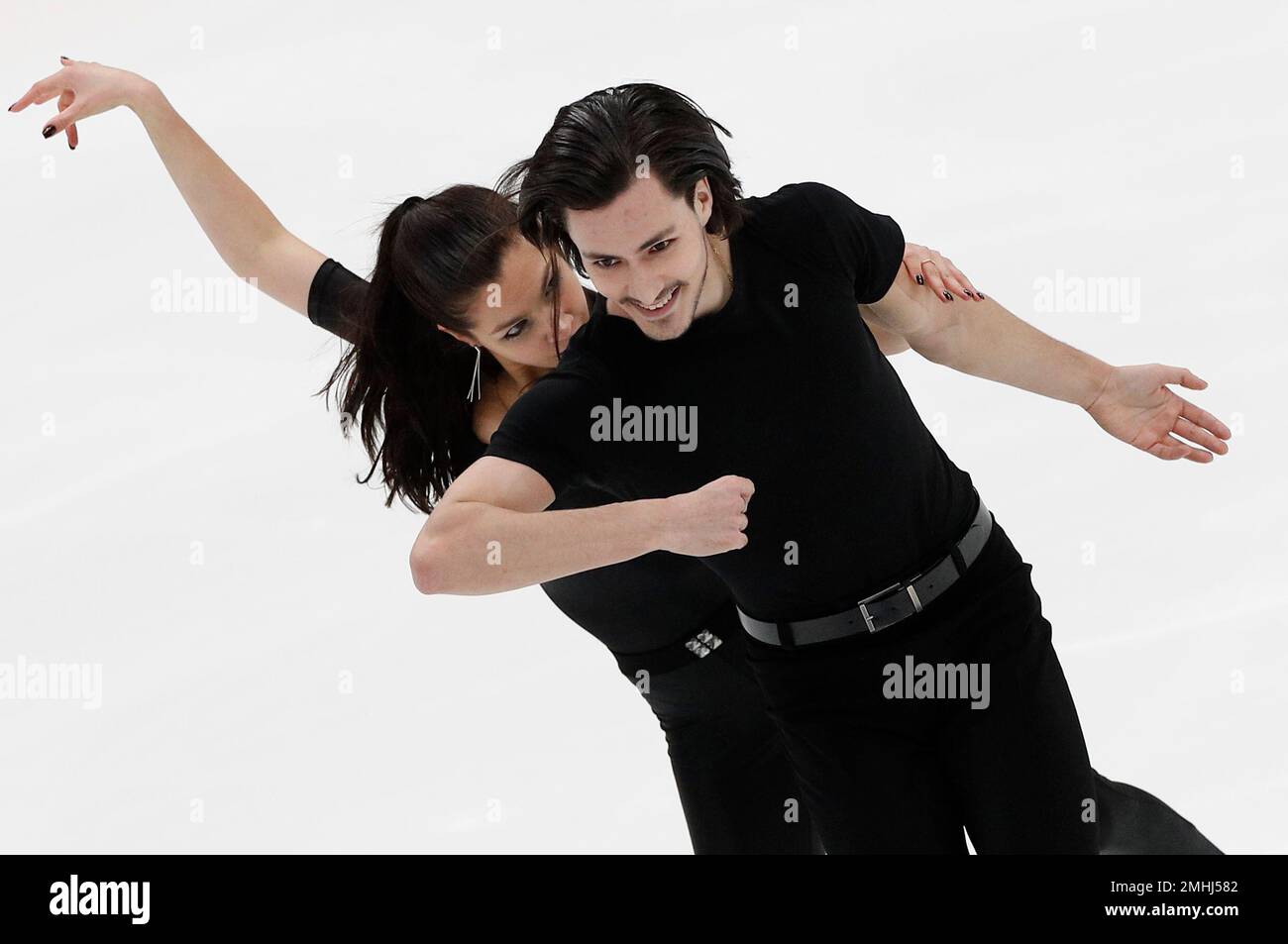 Anastasia Shpilevaya and Grigory Smirnov of Russia perform in the ice ...