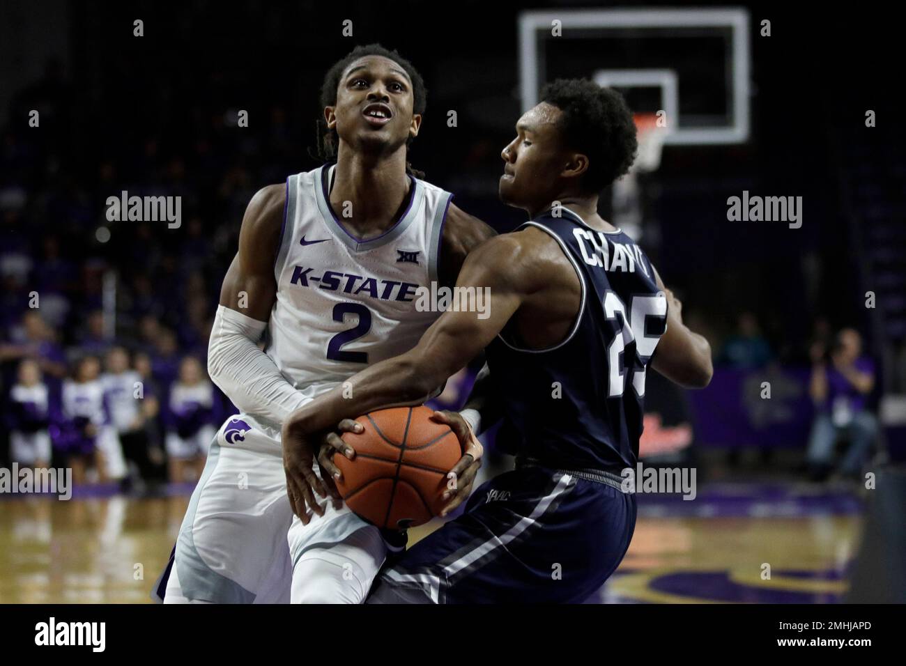 Kansas State guard Cartier Diarra (2) and Monmouth guard Samuel Chaput ...