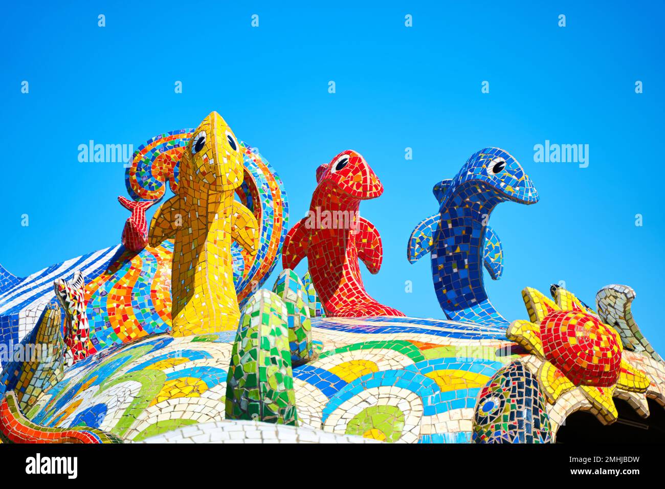 Sculptures of sea animals decorated with colored mosaics on the ...