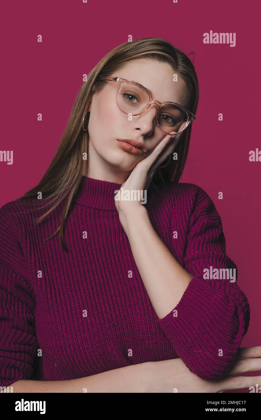 Bored caucasian woman attending uninteresting lecture leaning face palm ...