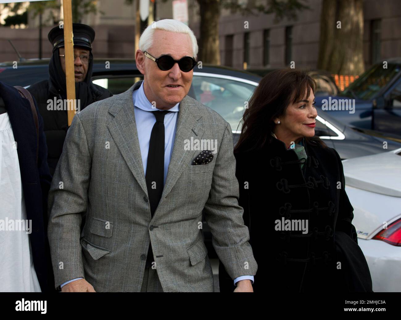 Roger Stone accompanied by his wife Nydia Stone, right, arrives at ...
