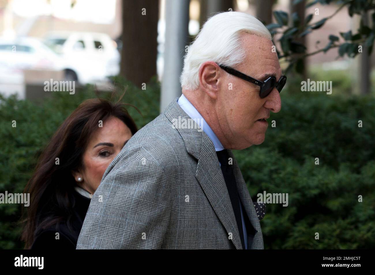Roger Stone accompanied by his wife Nydia Stone, left, arrives at ...