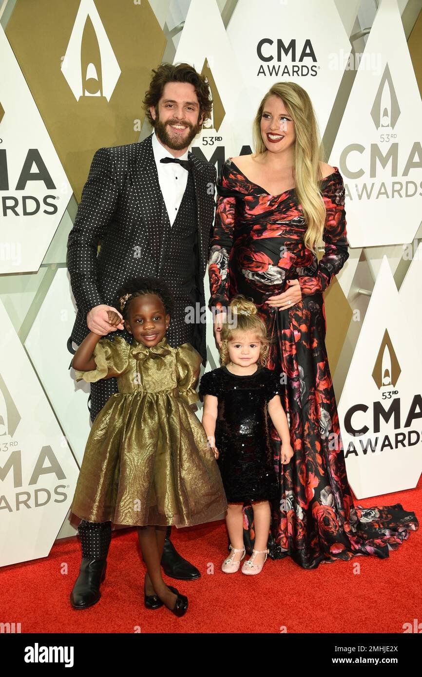 Thomas Rhett, top left, Lauren Akins, Willa Gray Akins, bottom left ...