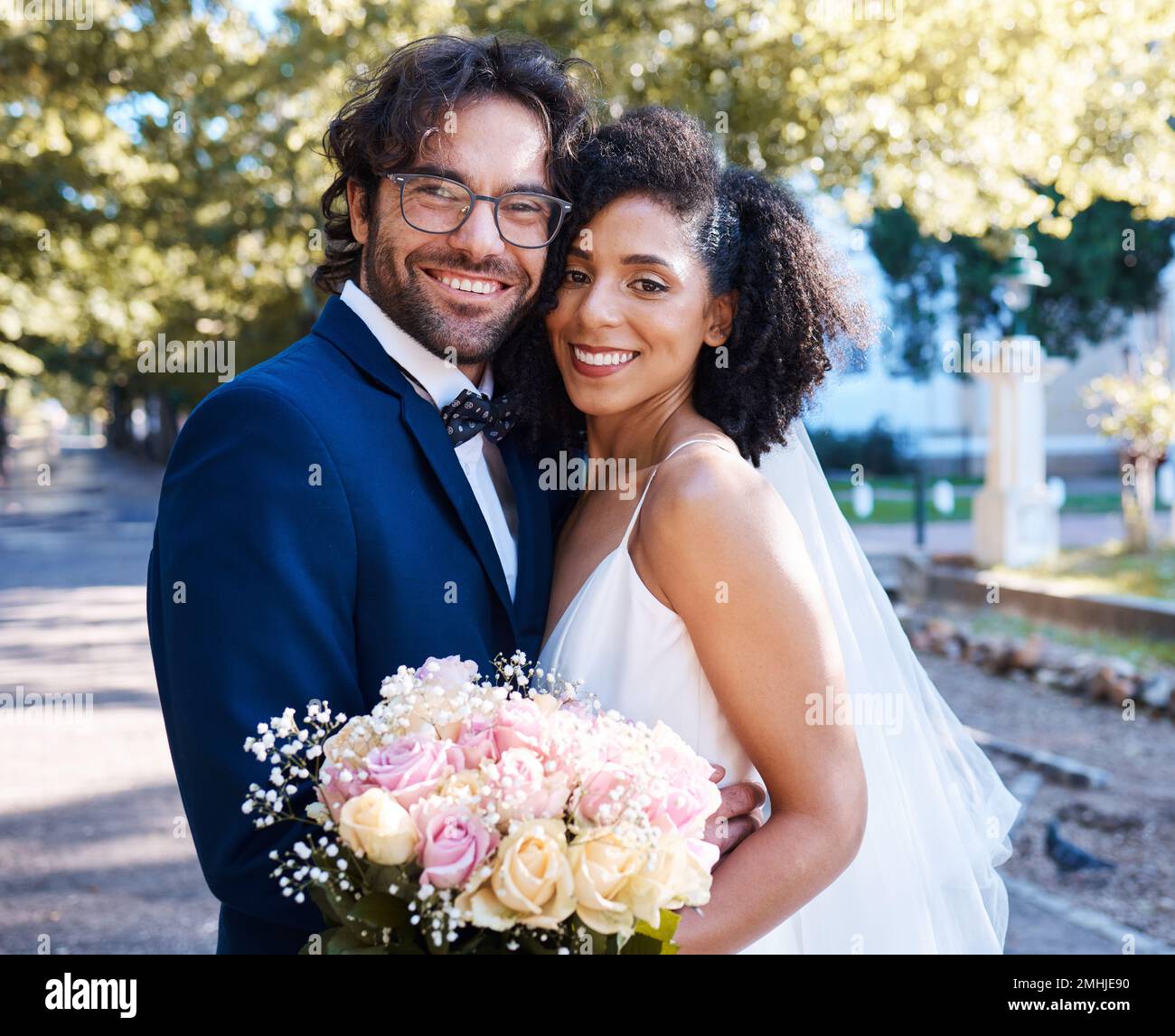 Wedding, bride and groom portrait with flowers and hug at romantic ...