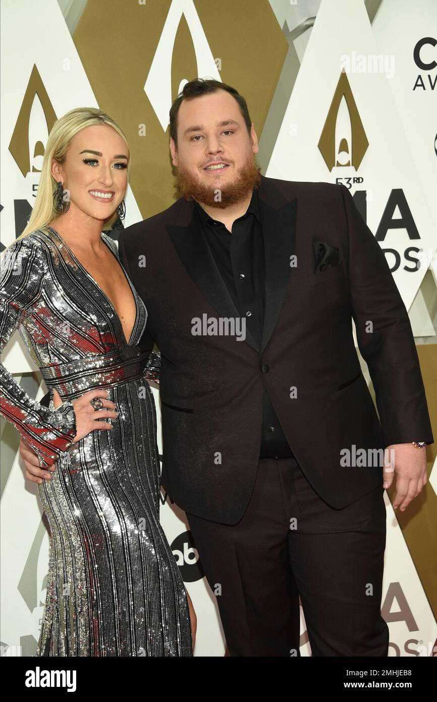 Luke Combs, right, and Nicole Hocking arrive at the 53rd annual CMA ...