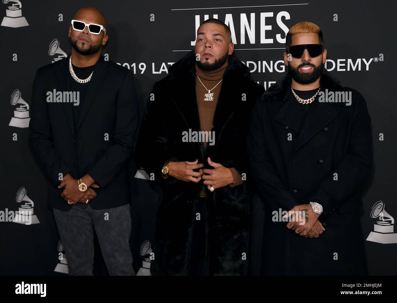 Xavier Semper, left, and Edgar Semper, center, of Mambo Kingz, and DJ ...