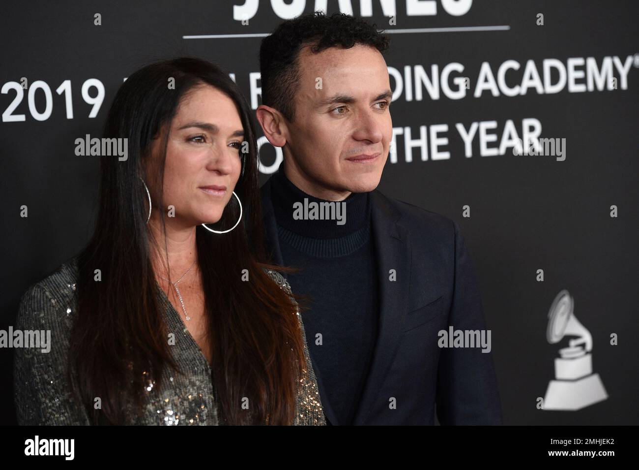 Juliana Posada, left, and Fonseca arrive at the Latin Recording Academy ...