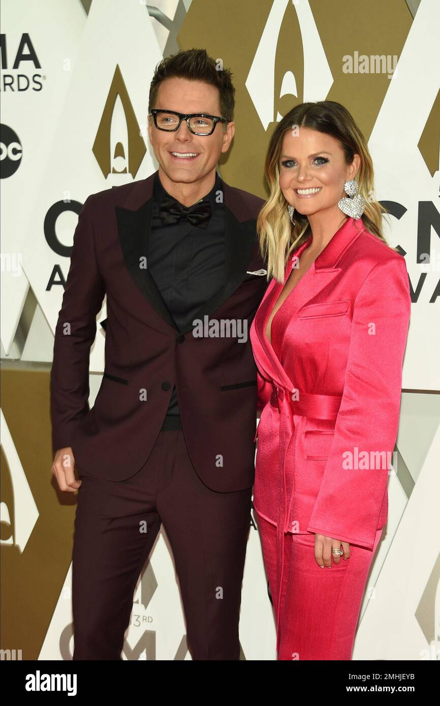 Bobby Bones, left, and Amy Brown arrive at the 53rd annual CMA Awards ...