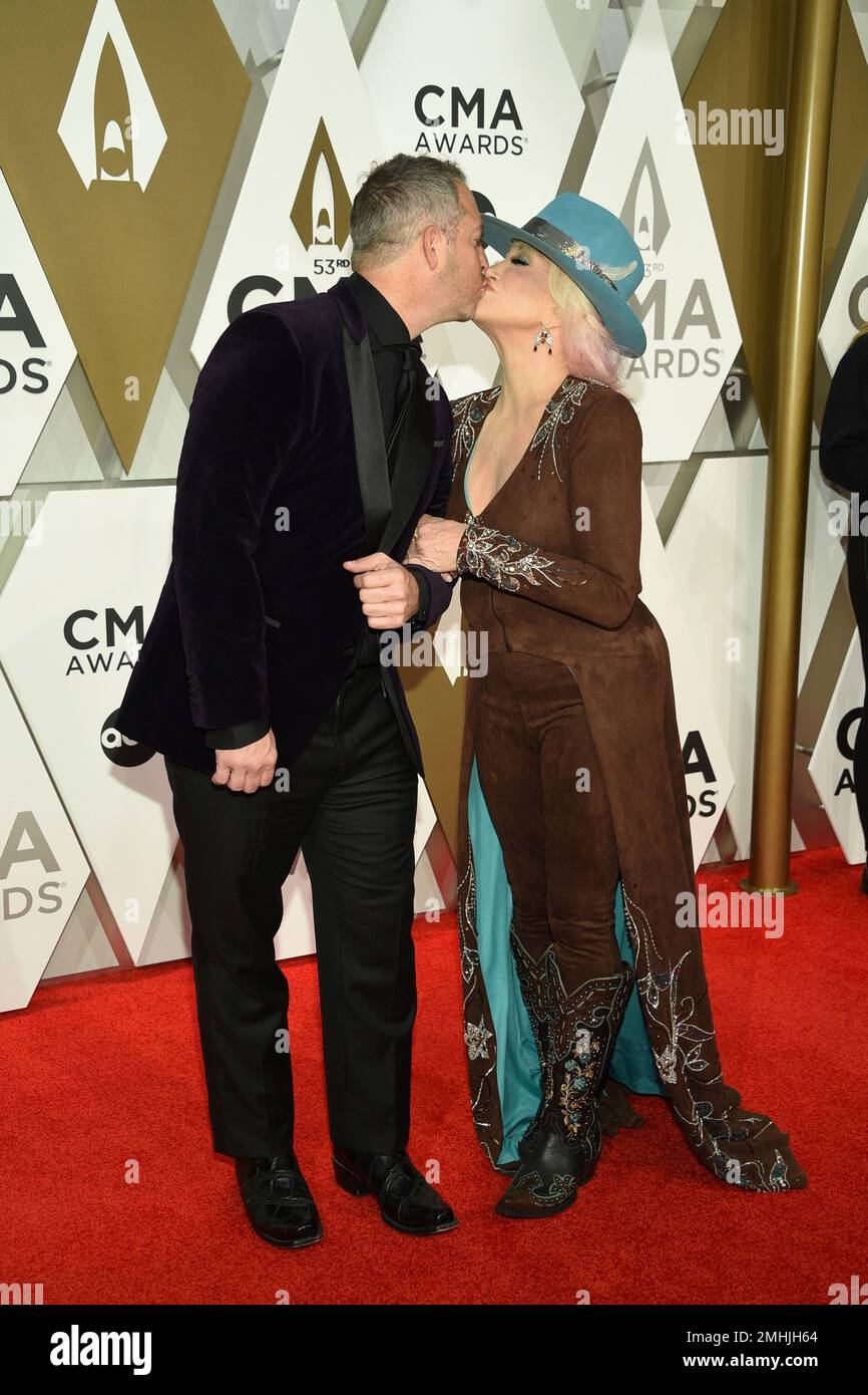 Buddy Quaid, left, and Tanya Tucker arrive at the 53rd annual CMA ...