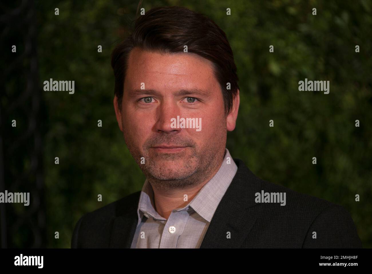 Director Benjamin Caron poses for photographers upon arrival at the ...
