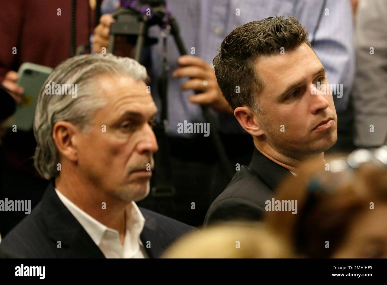 San Francisco Giants third base coach Ron Wotus, left, and catcher ...