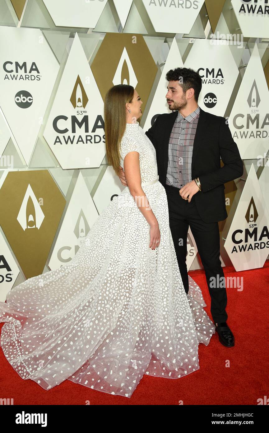 Hannah Brown, left, and Alan Bersten arrive at the 53rd annual CMA ...