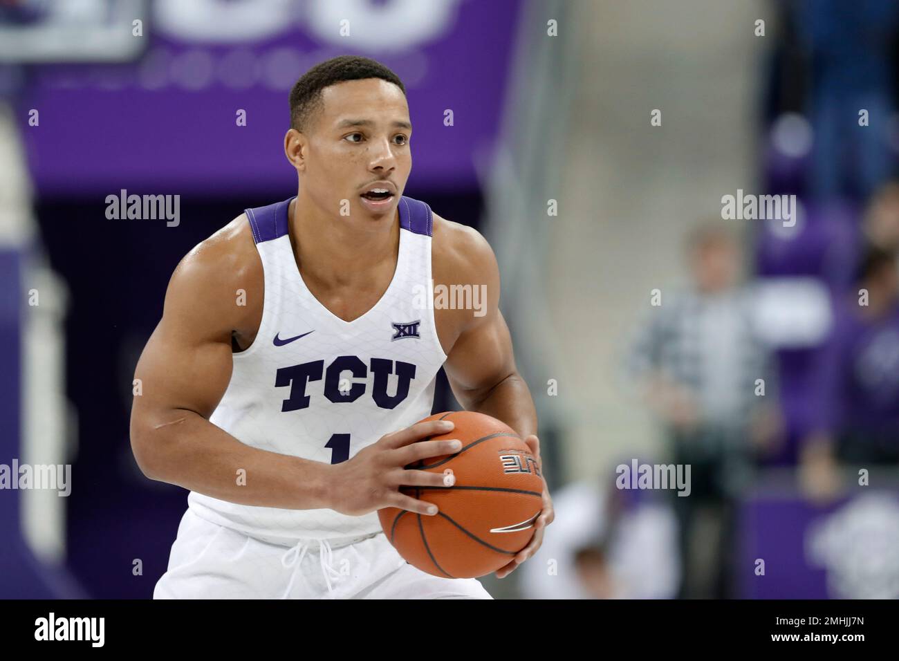 TCU guard Desmond Bane (1) handles the ball during an NCAA college ...