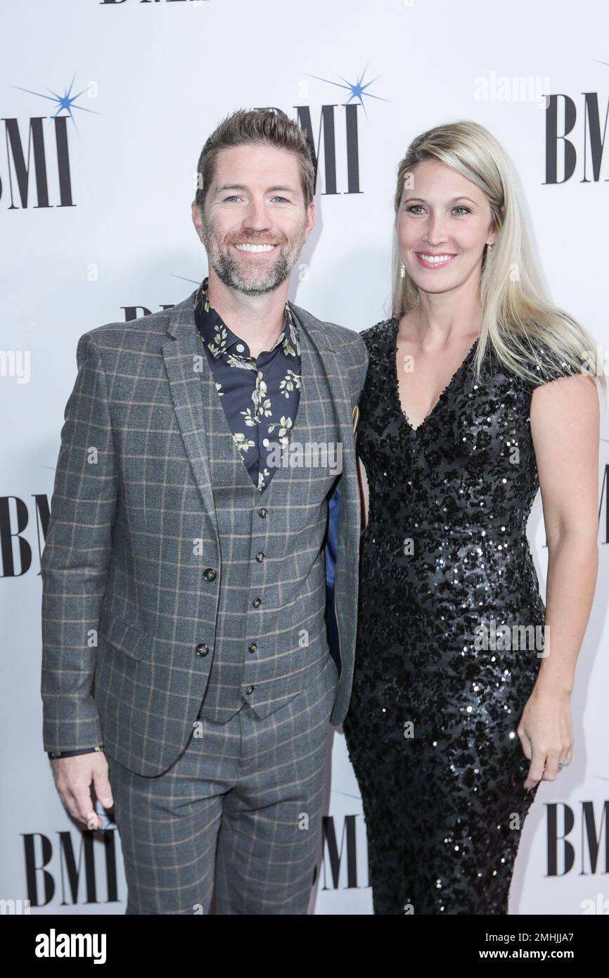 Josh Turner, left, and his wife, Jennifer Ford, arrive at 67th Annual ...