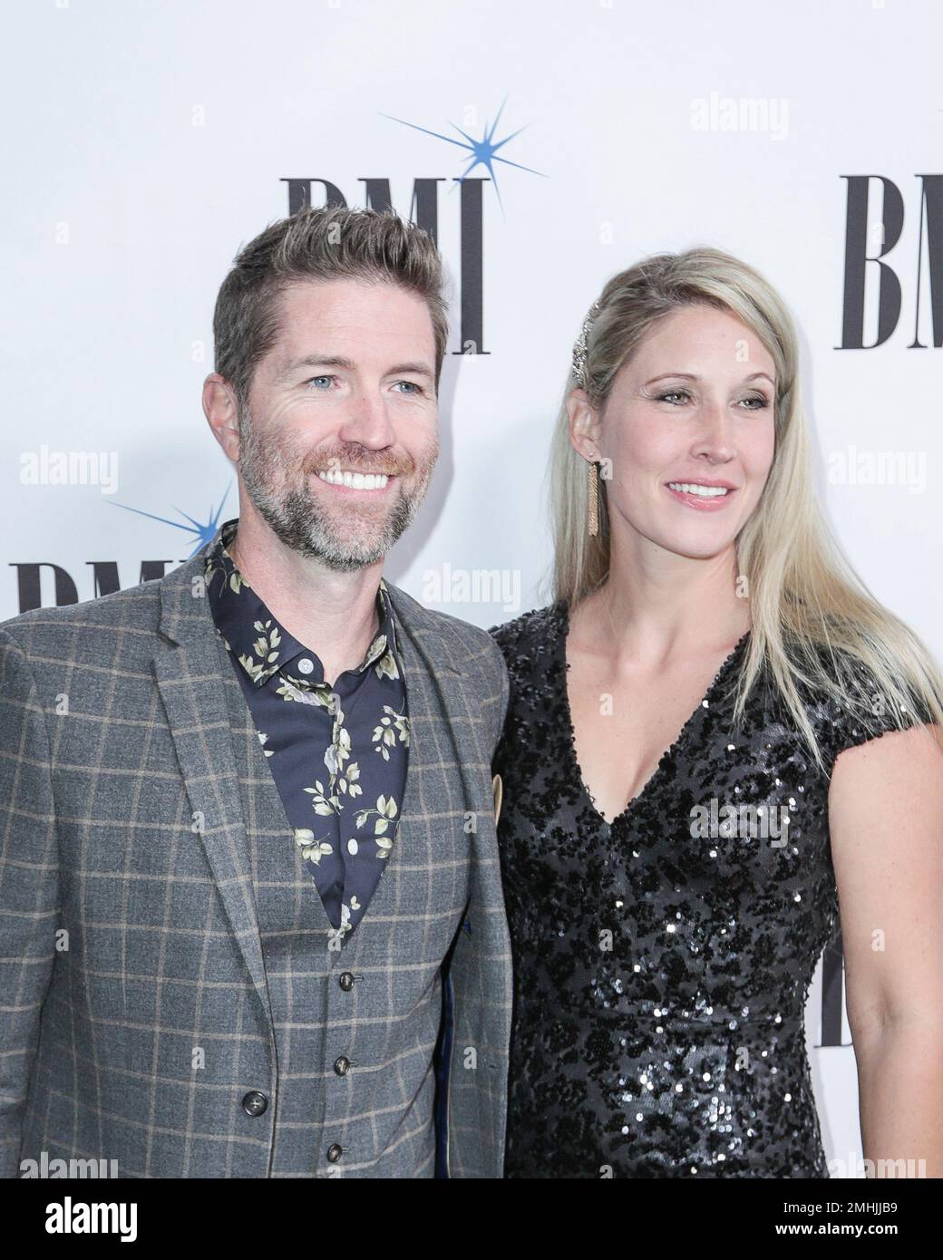 Josh Turner, left, and his wife, Jennifer Ford, arrive at 67th Annual ...