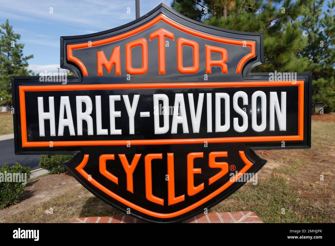 Harley Davidson sign marks the entrance to a Harley Davidson dealership ...