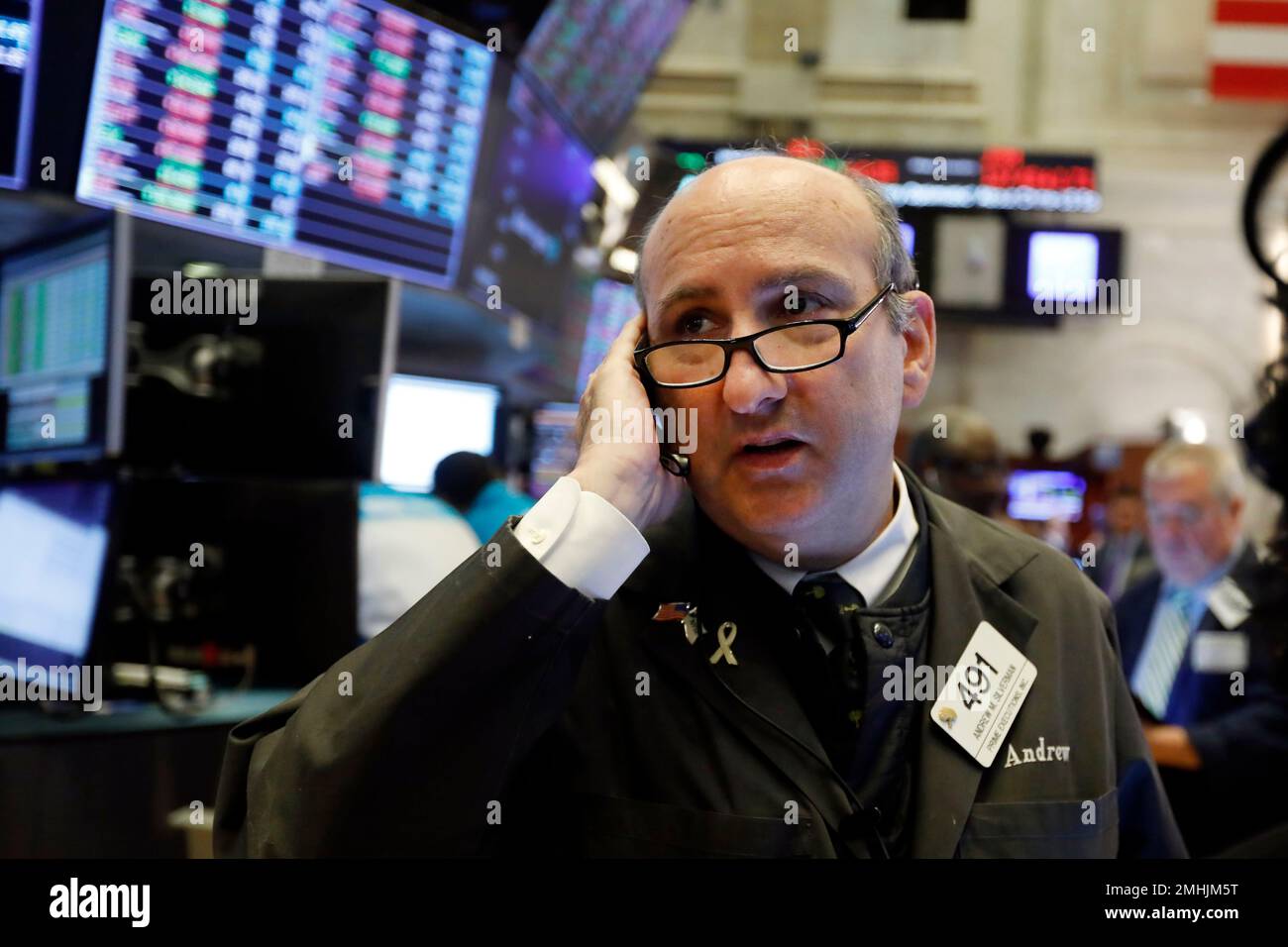Trader Andrew Silverman works on the floor of the New York Stock ...