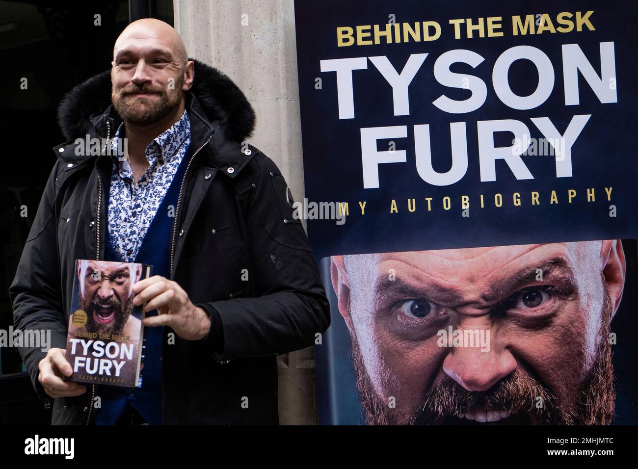 British professional boxer poses for photographers before signing ...