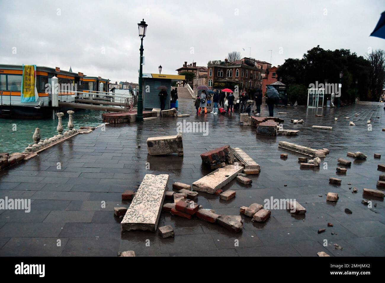 Parts of a dock lie damaged, in Venice, Italy, Wednesday, Nov. 13, 2019 ...