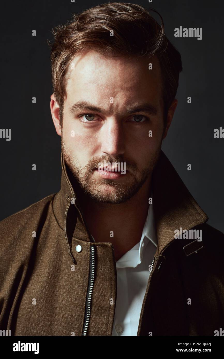 Masculine style for a manly man. Studio portrait of a handsome young ...