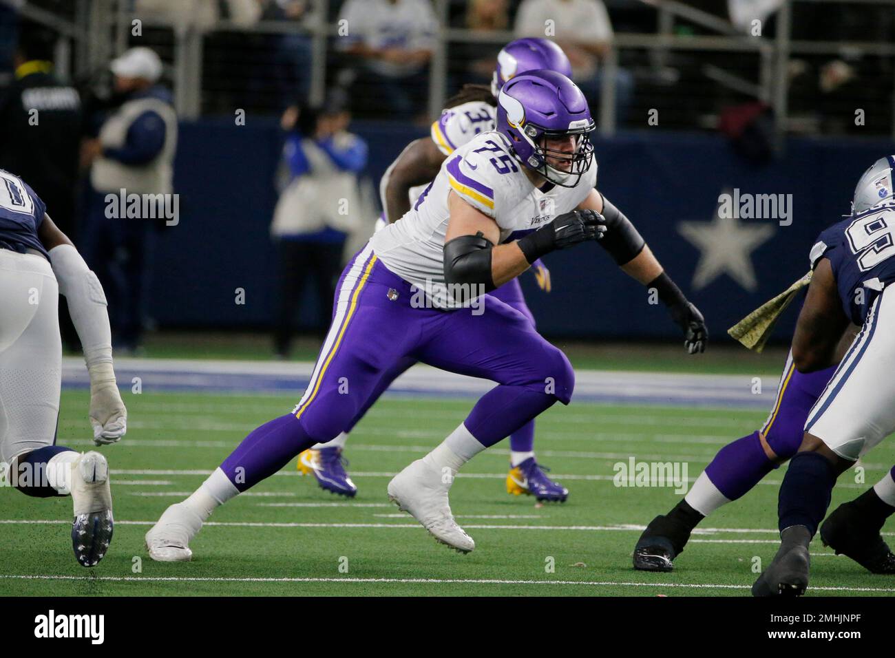 Minnesota Vikings offensive tackle Brian O'Neill (75) prepares to block ...