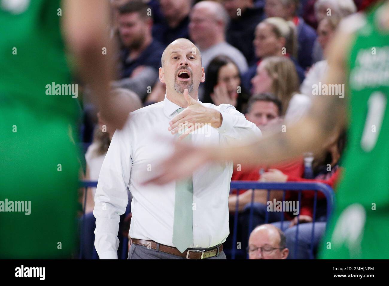 North Dakota head coach Paul Sather shouts to his players during the ...