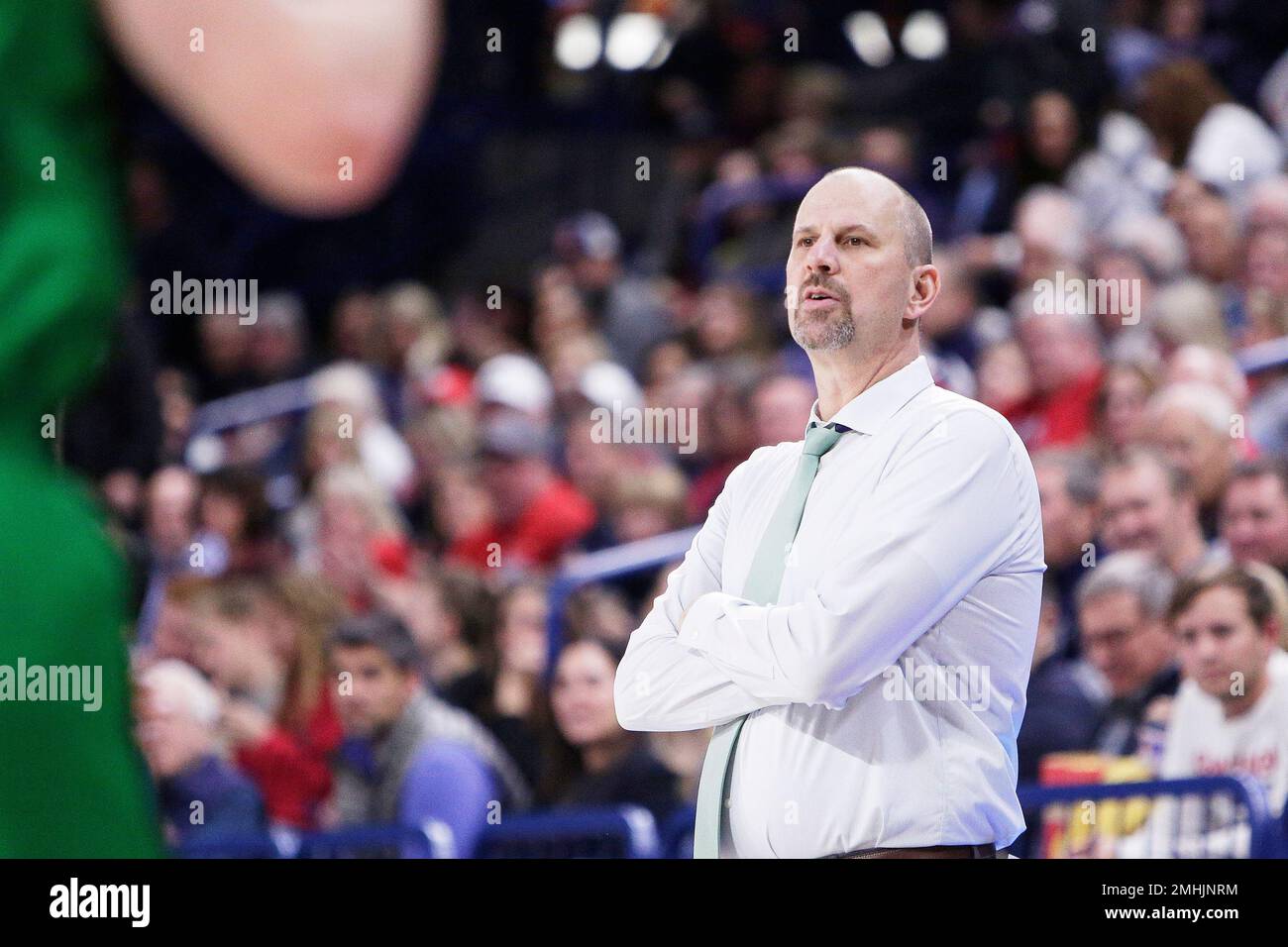 North Dakota head coach Paul Sather speaks to his players during the ...