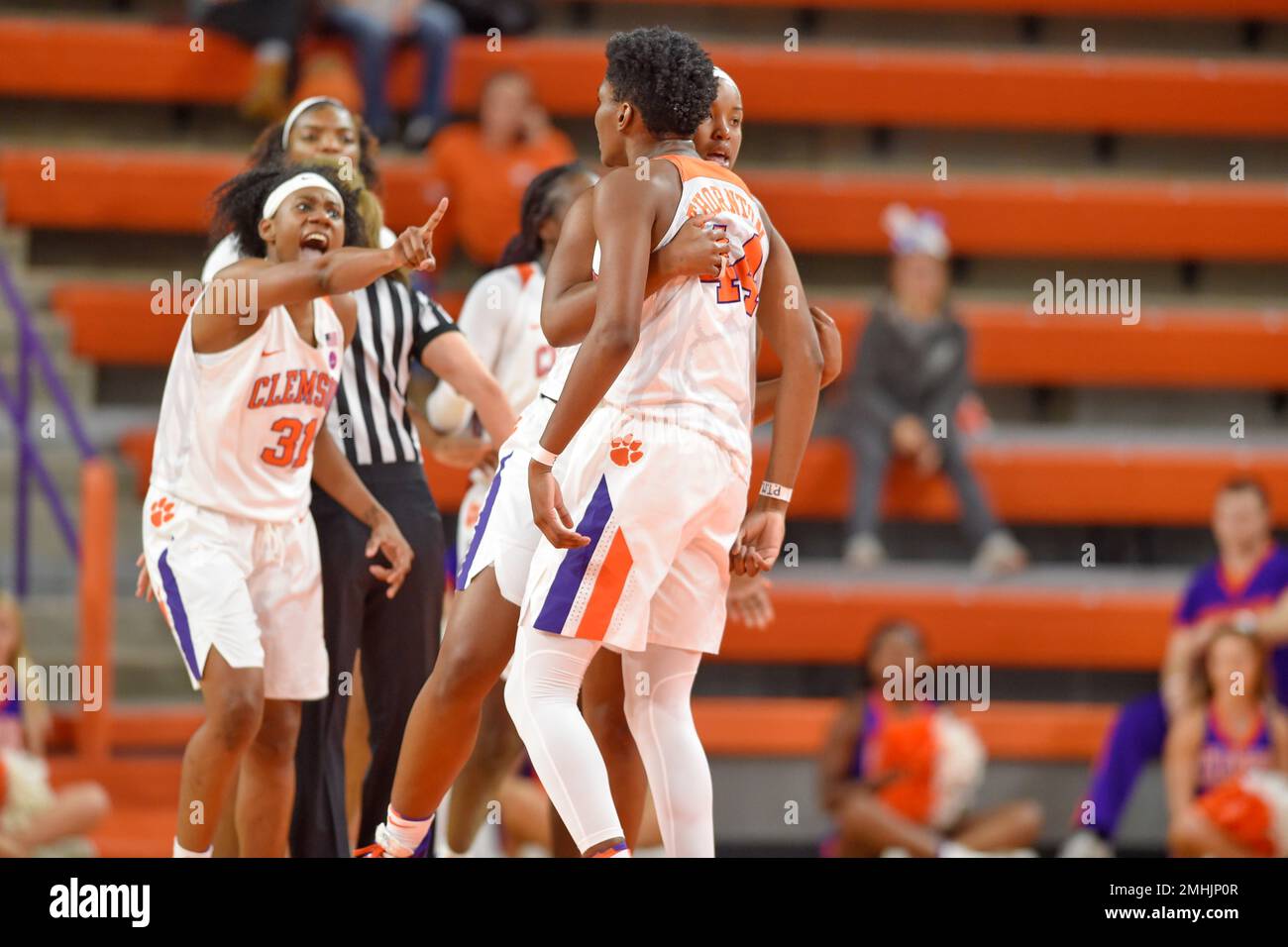 Clemson's Kobi Thorton, right, is restrained by teammate Amari Robinson ...