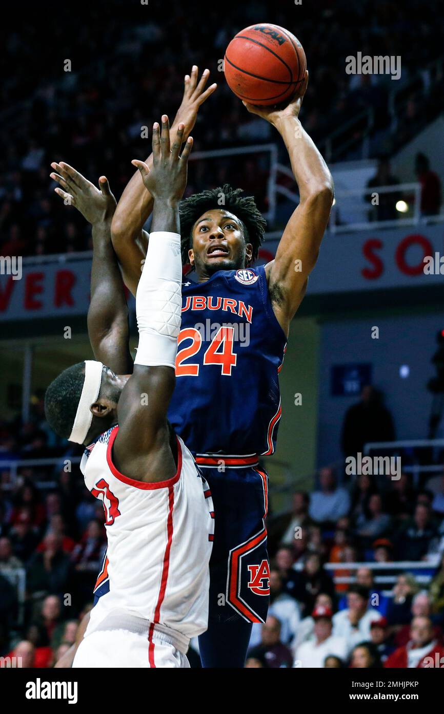 Auburn forward Anfernee McLemore (24) puts up a shot over South Alabama ...