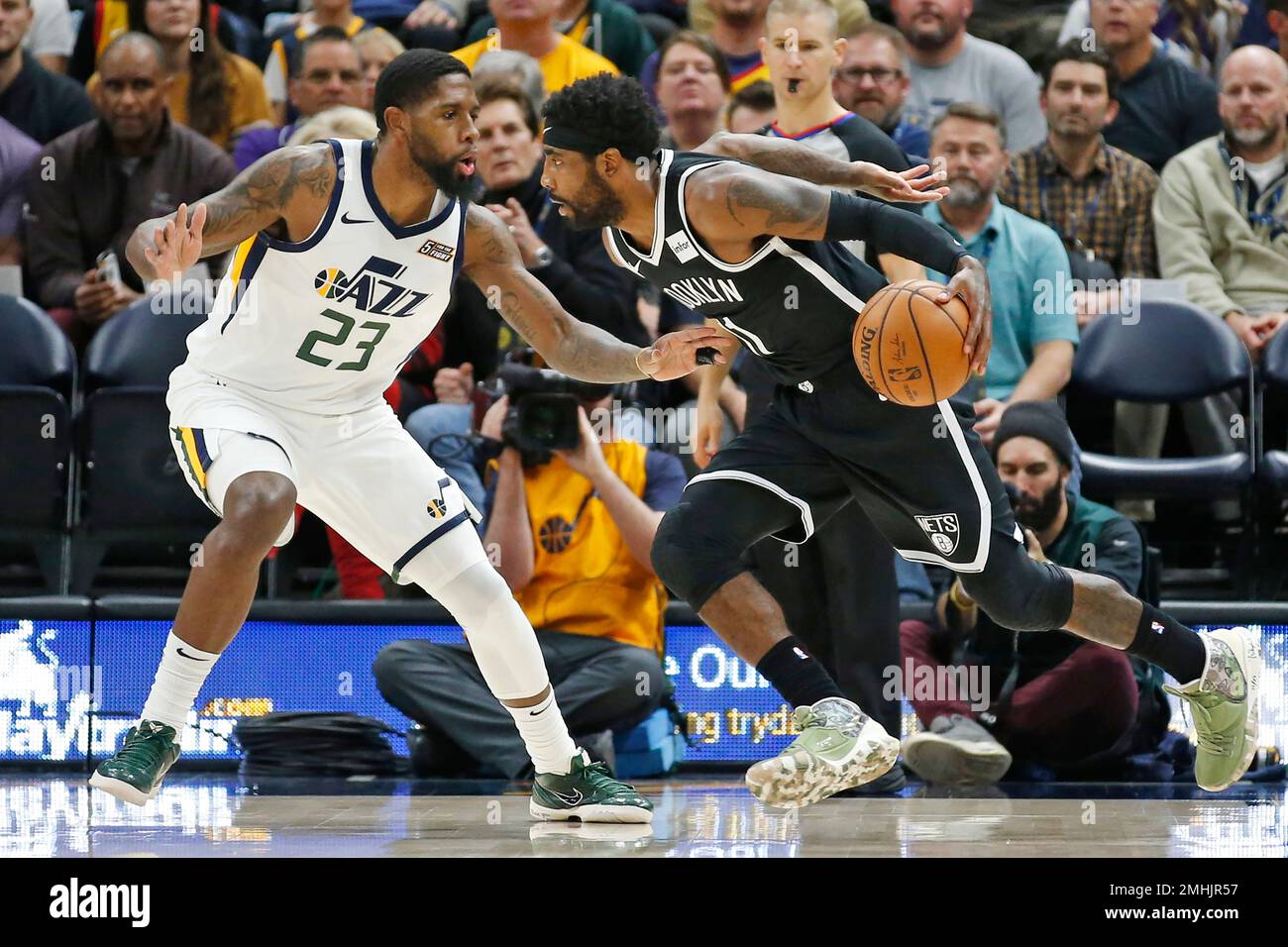 Utah Jazz forward Royce O'Neale (23) grads Brooklyn Nets guard Kyrie ...