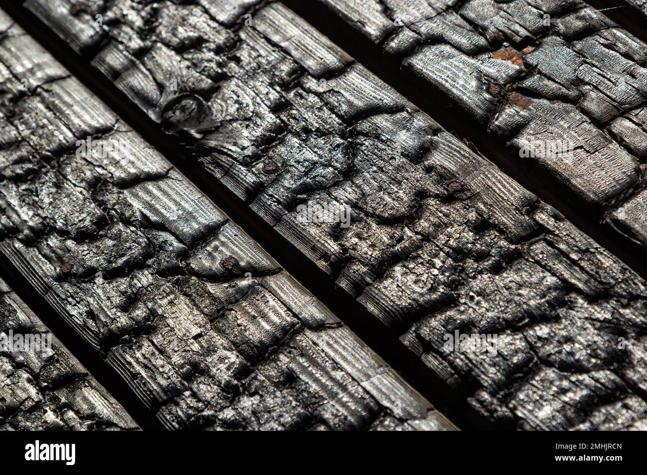 Black wooden board texture, close up. BBQ background. Burnt wooden ...