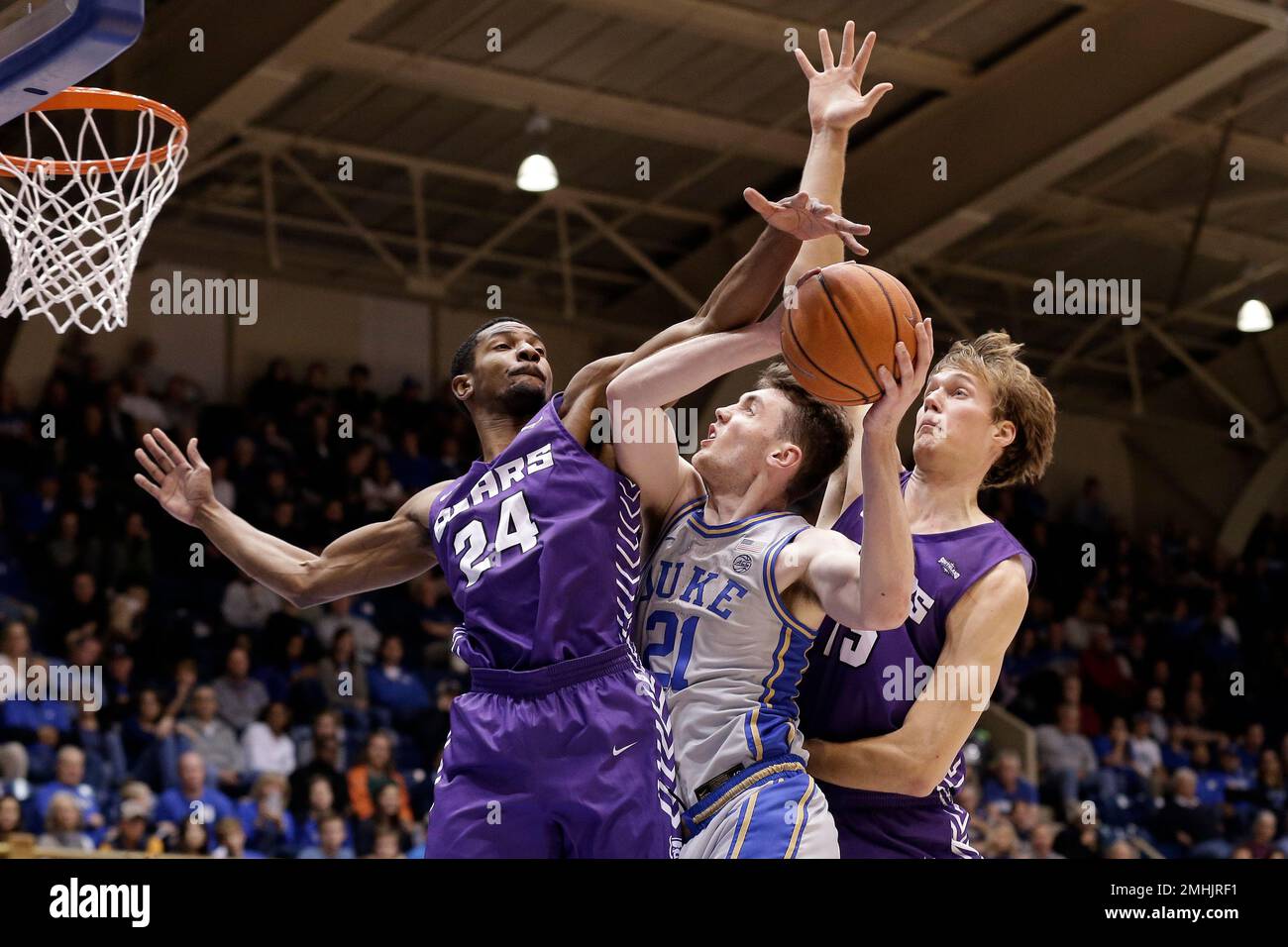 Central Arkansas forward Jared Chatham (24) and center Hayden Koval (15 ...