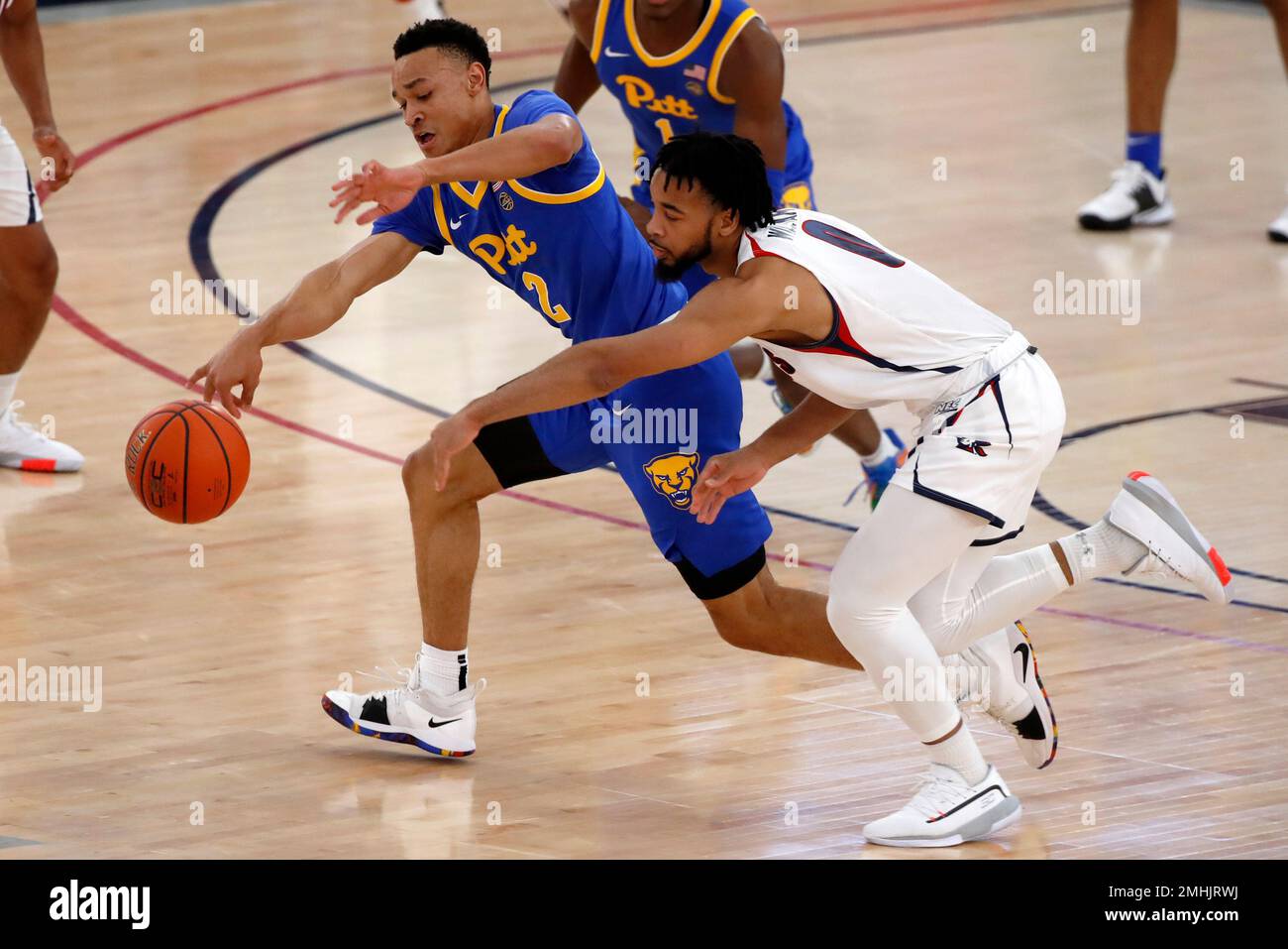 Pittsburgh 's Trey McGowens (2) brings the ball up court against Robert ...