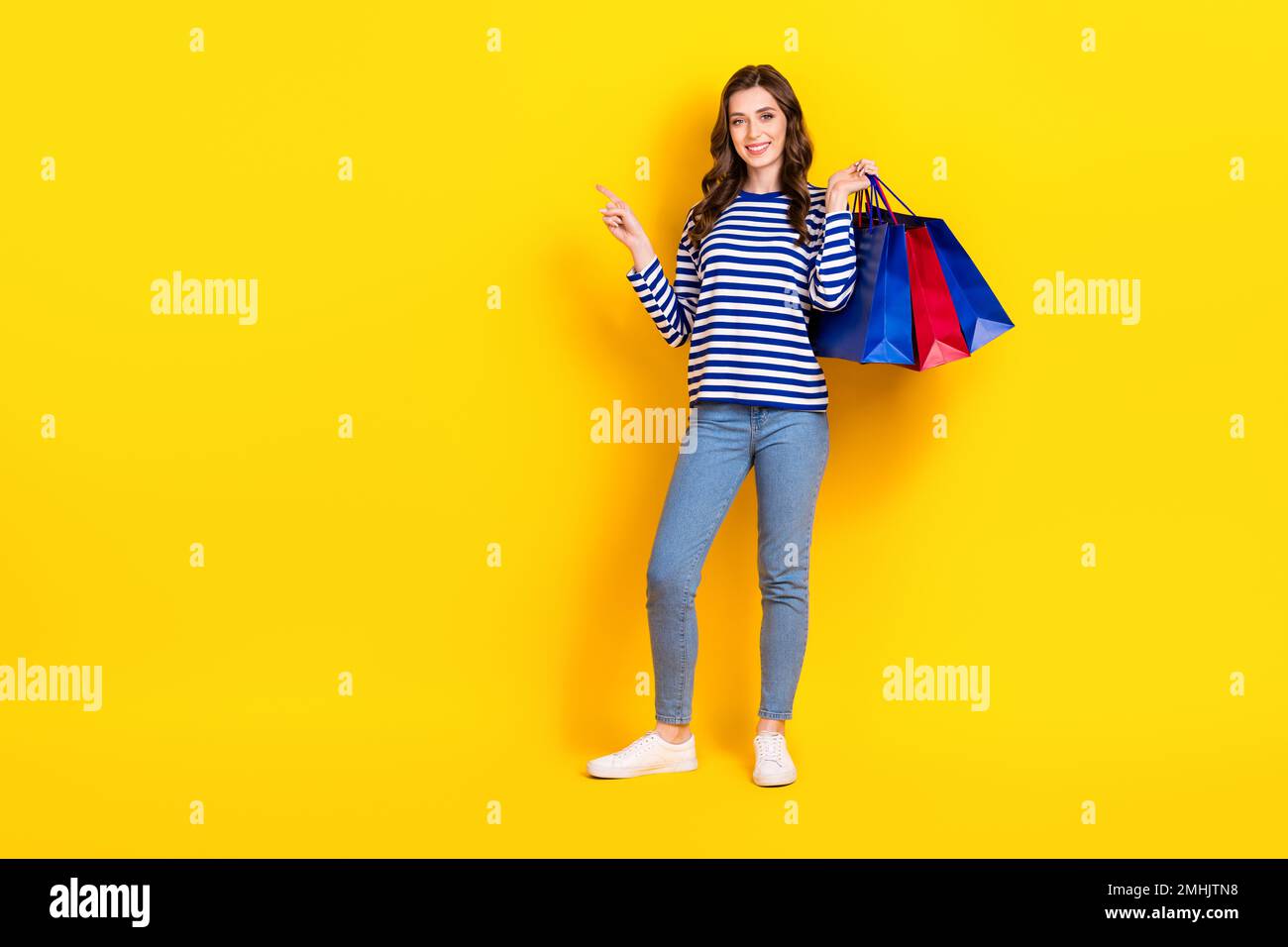 Full body photo of pretty young girl point empty space black friday ...