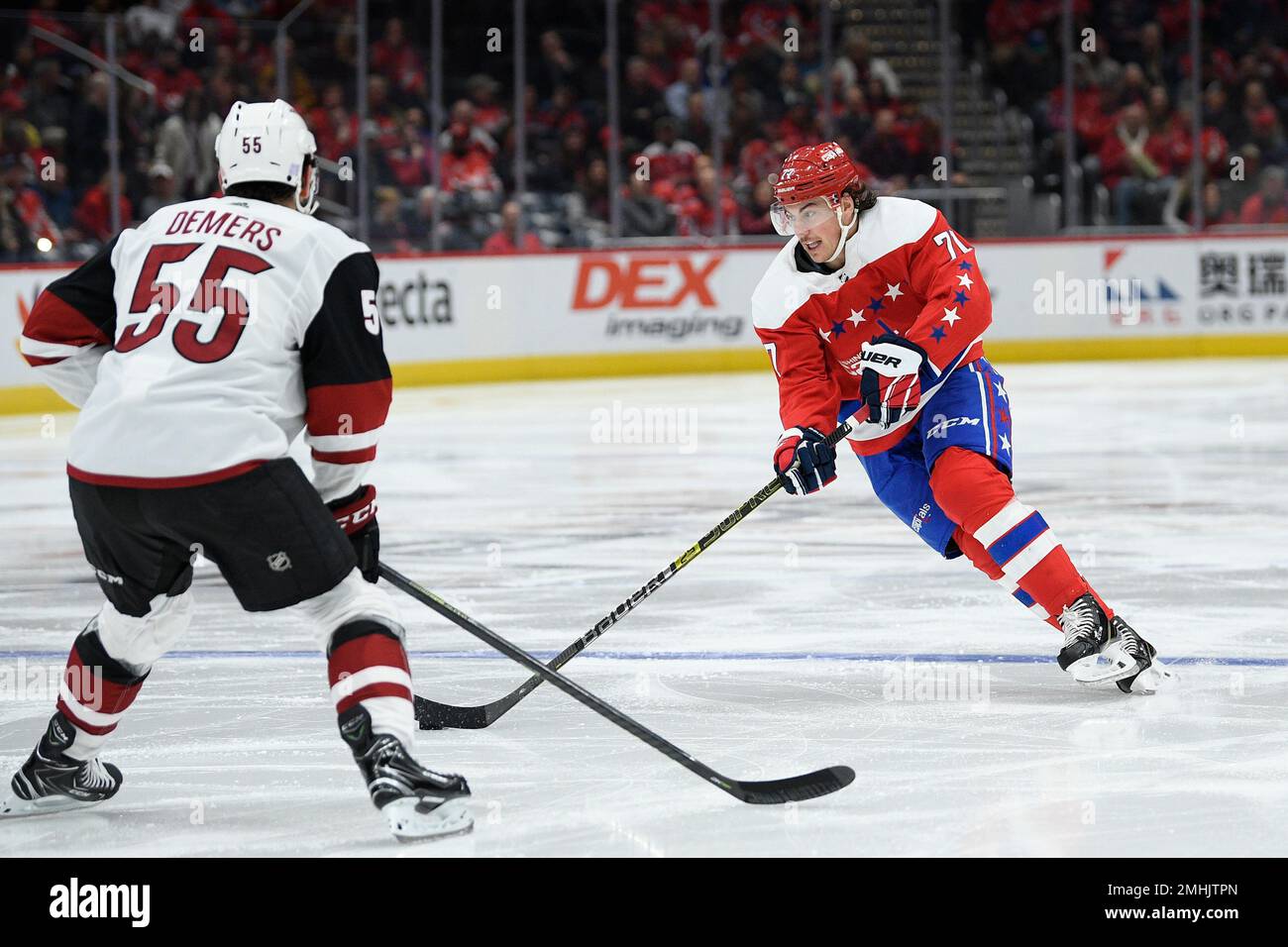 Washington Capitals right wing T.J. Oshie (77) skates with the puck ...
