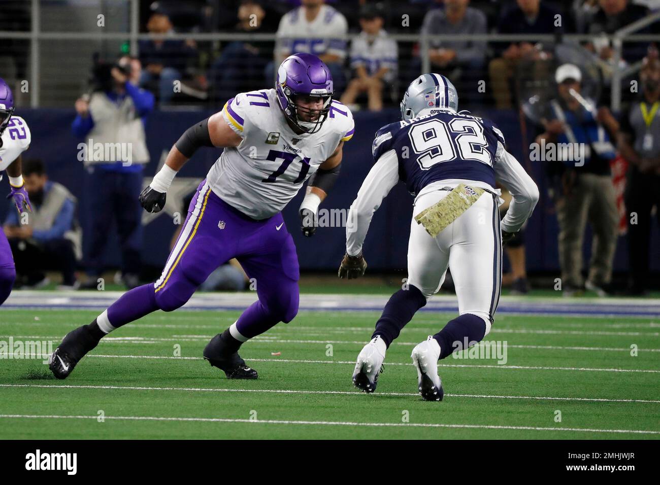 Minnesota Vikings offensive tackle Riley Reiff (71) faces off against ...