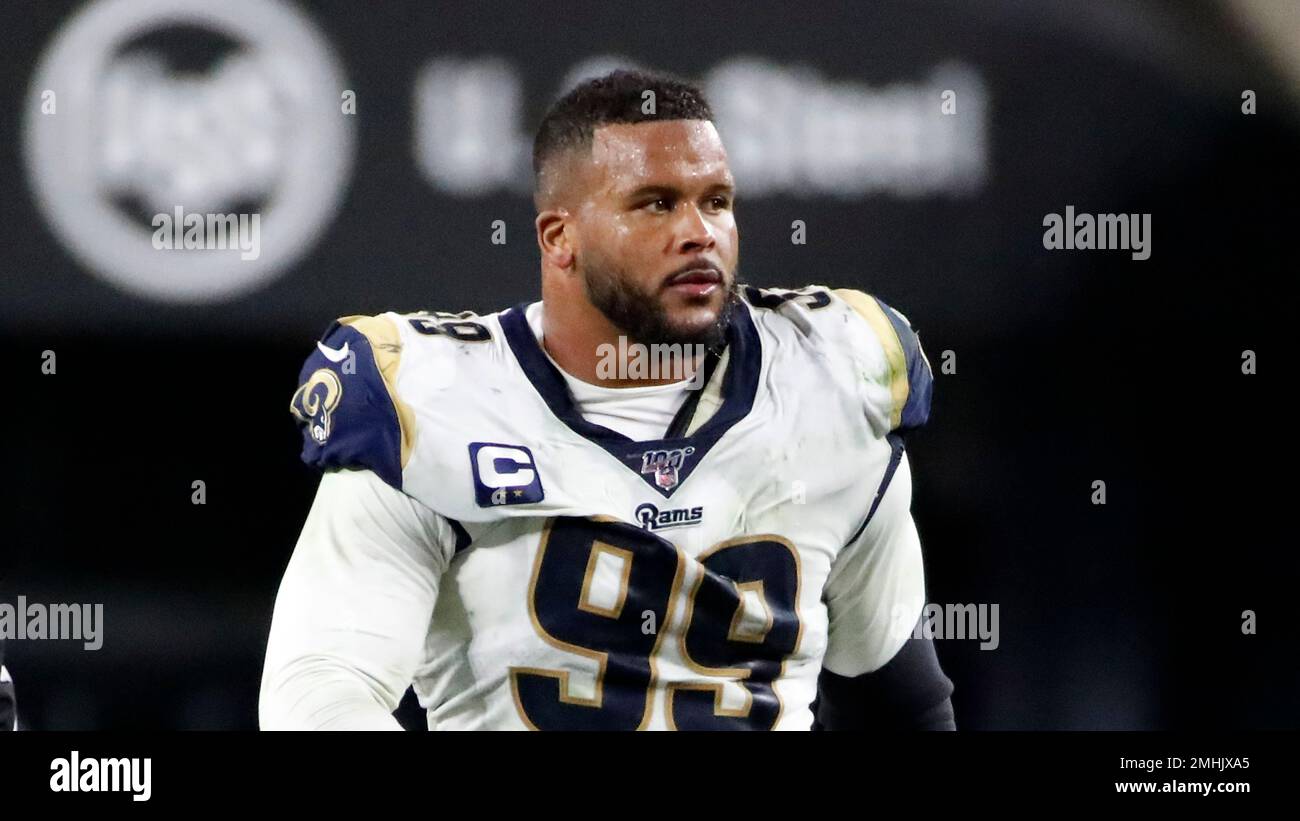 Los Angeles Rams defensive tackle Aaron Donald walks to his bench ...